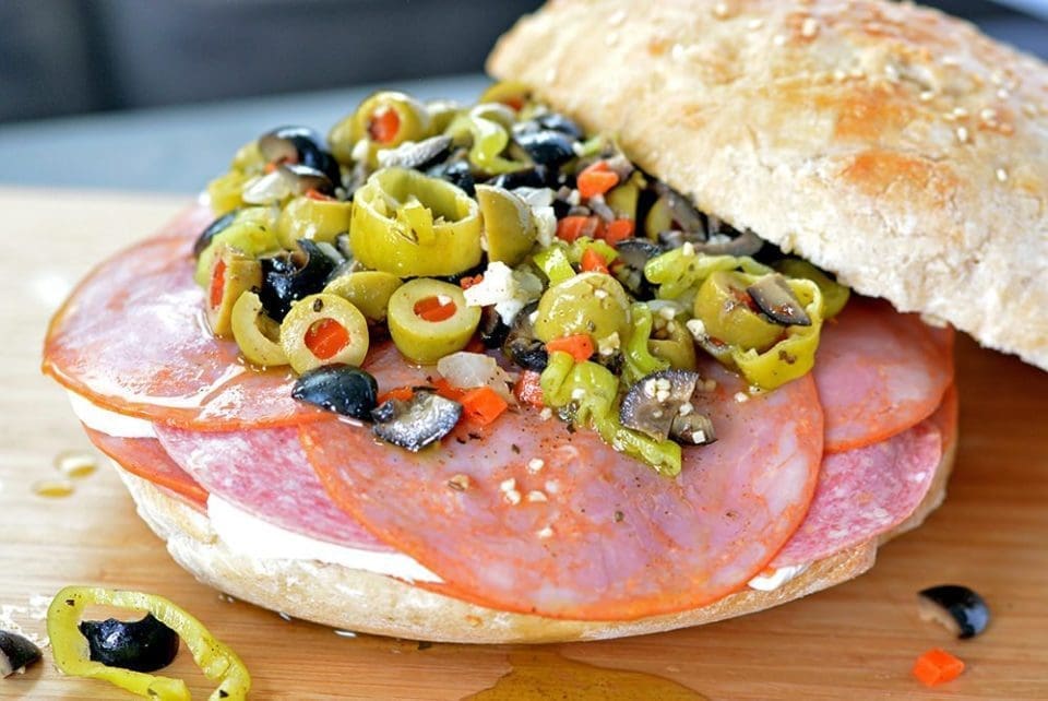 Muffaletta Sandwich with Homemade Olive Salad - Foodie and Wine